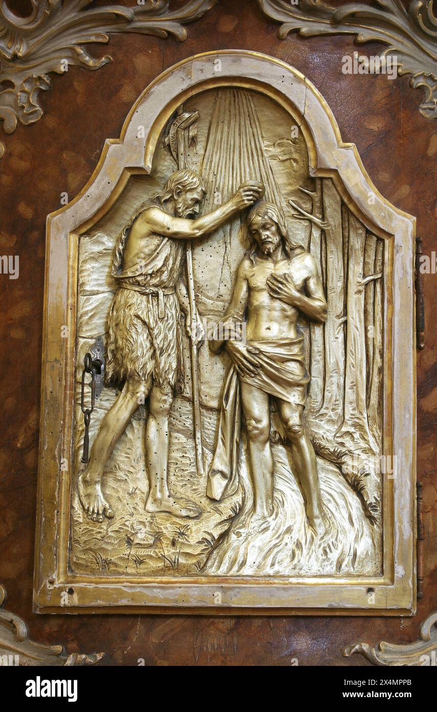 Baptism of the Lord, detail of the baptismal font in the parish church ...