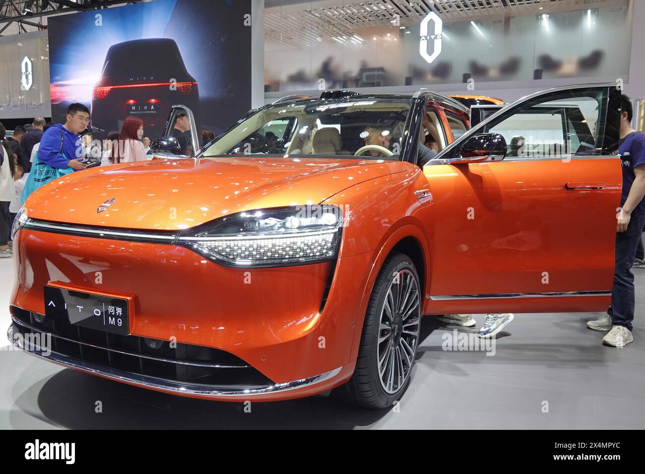 BEIJING, CHINA - MAY 3, 2024 - Visitors look at a AITO M9 electric car ...