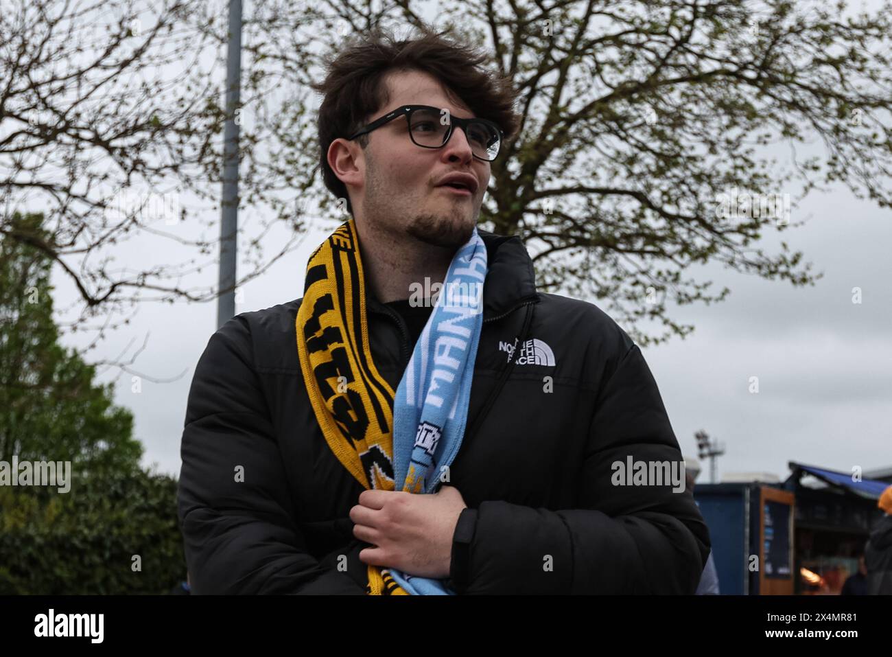 A fan with a Man City v Wolves scarf during the Premier League match ...