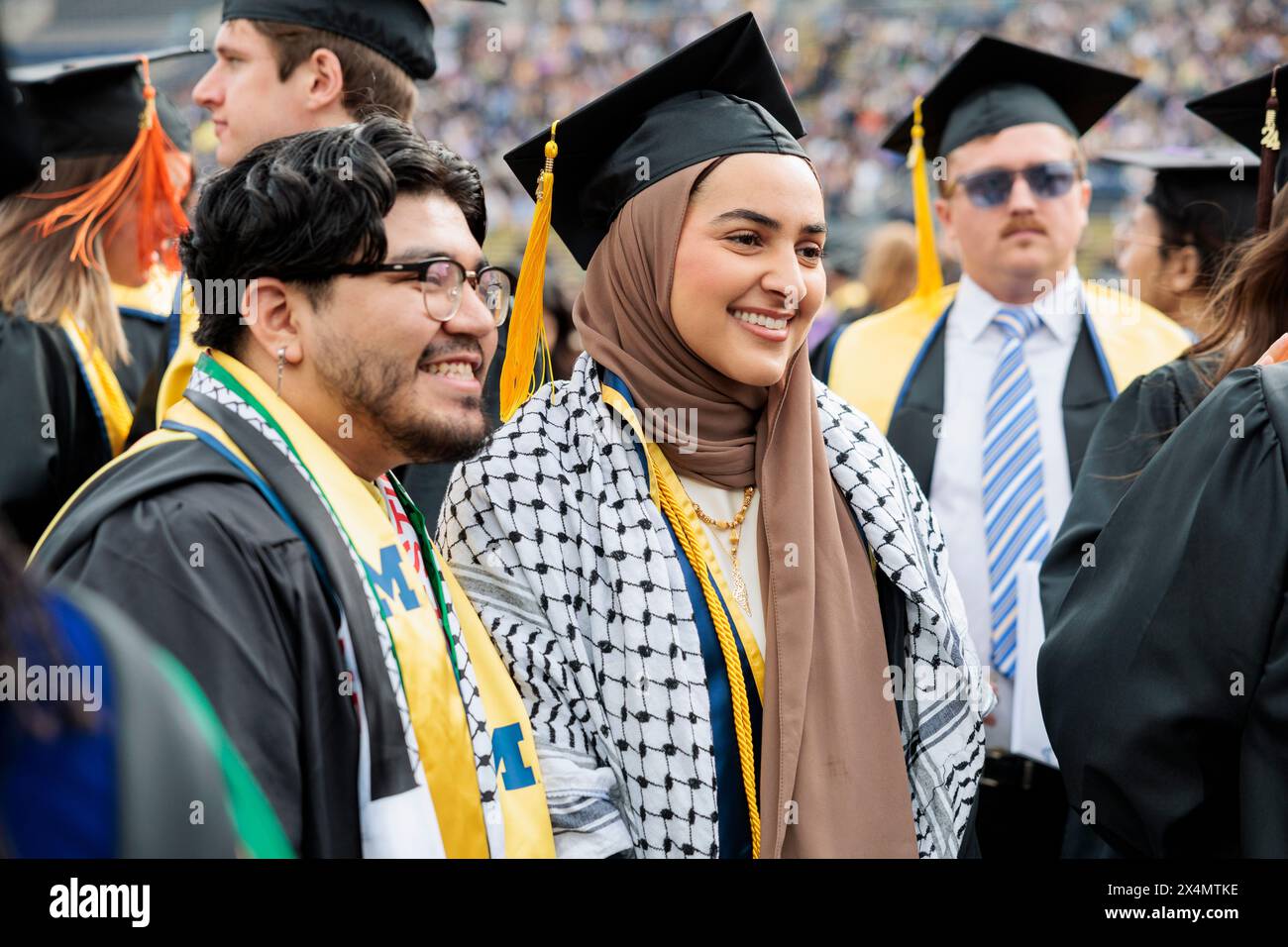 A student poses for a photo before the University of Michigan's Spring ...