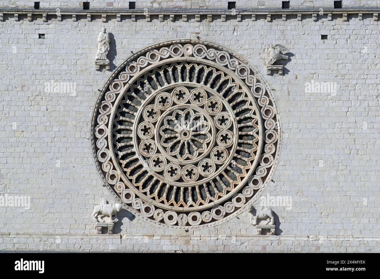 Rose window on the facade of the Basilica of Saint Francis of Assisi ...