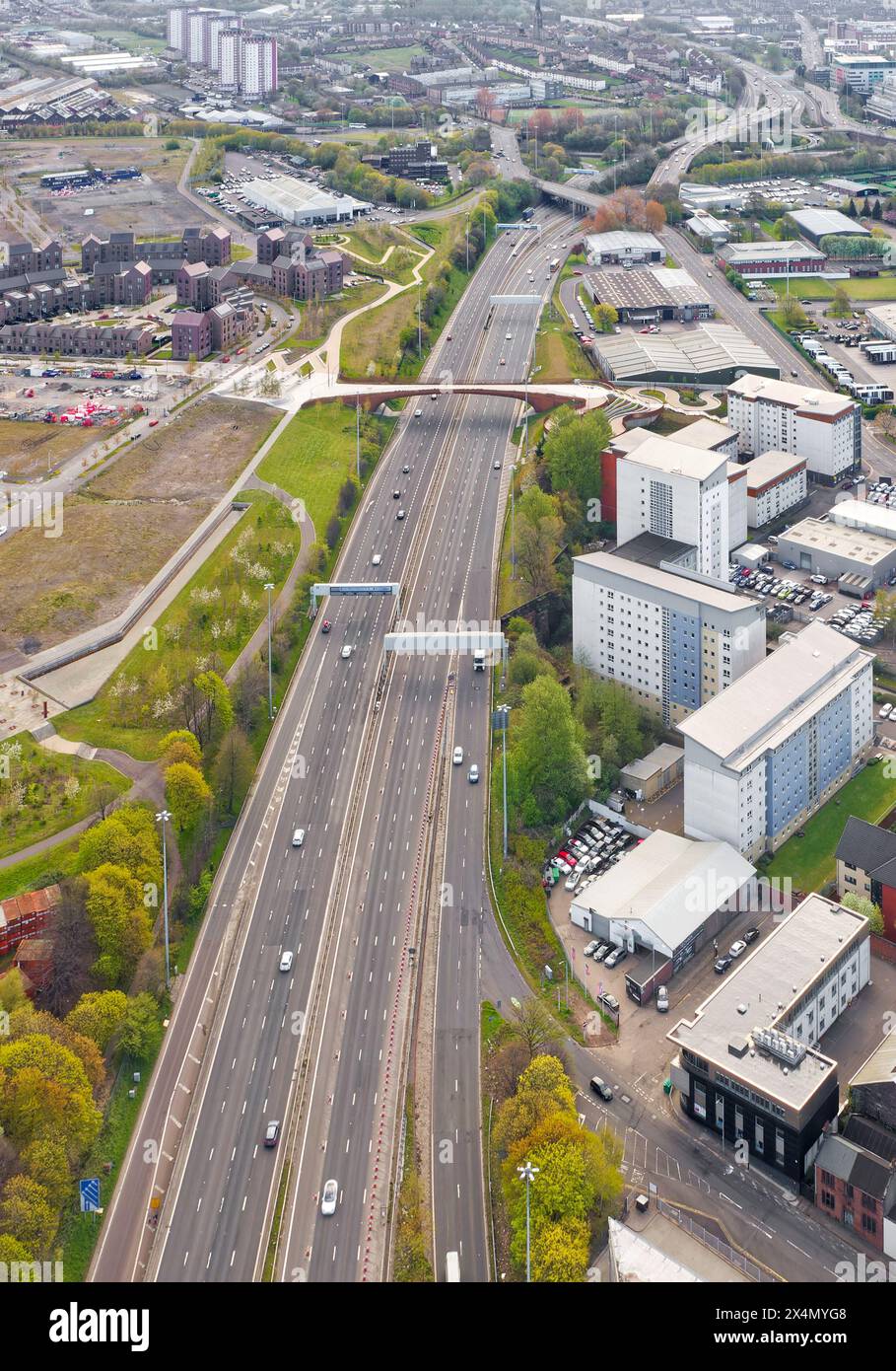 Pedestrian and cycling bridge over the M8 motorway in Glasgow viewed ...