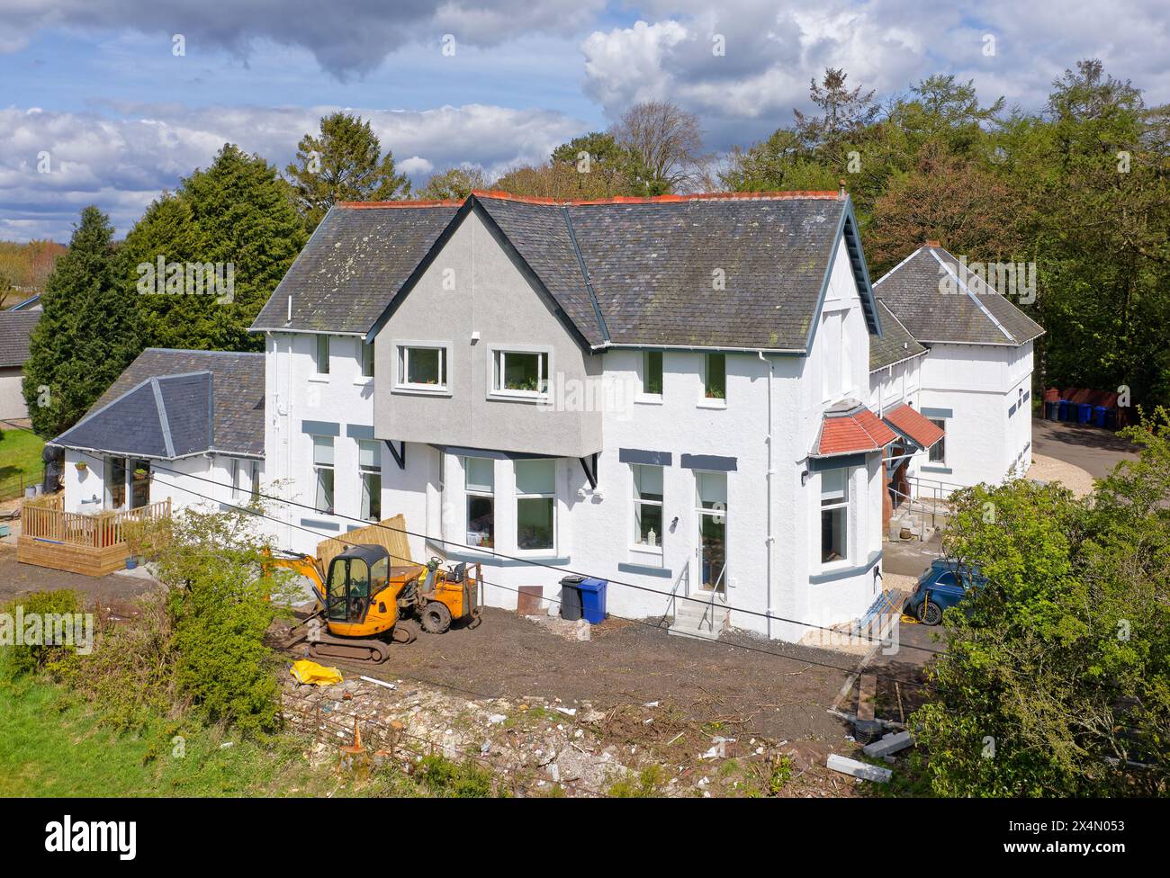 Large old building being converted into apartments in rural setting ...