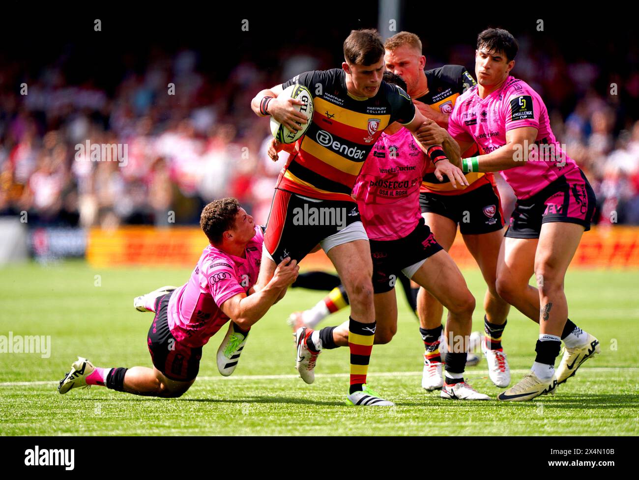 Gloucester Rugby's Seb Atkinson is tackled by Benetton Rugby's ...