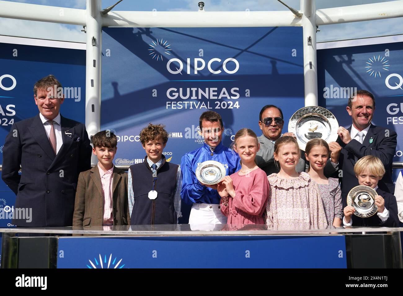 Jockey William Buick (centre) and trainer Charlie Appleby (right ...