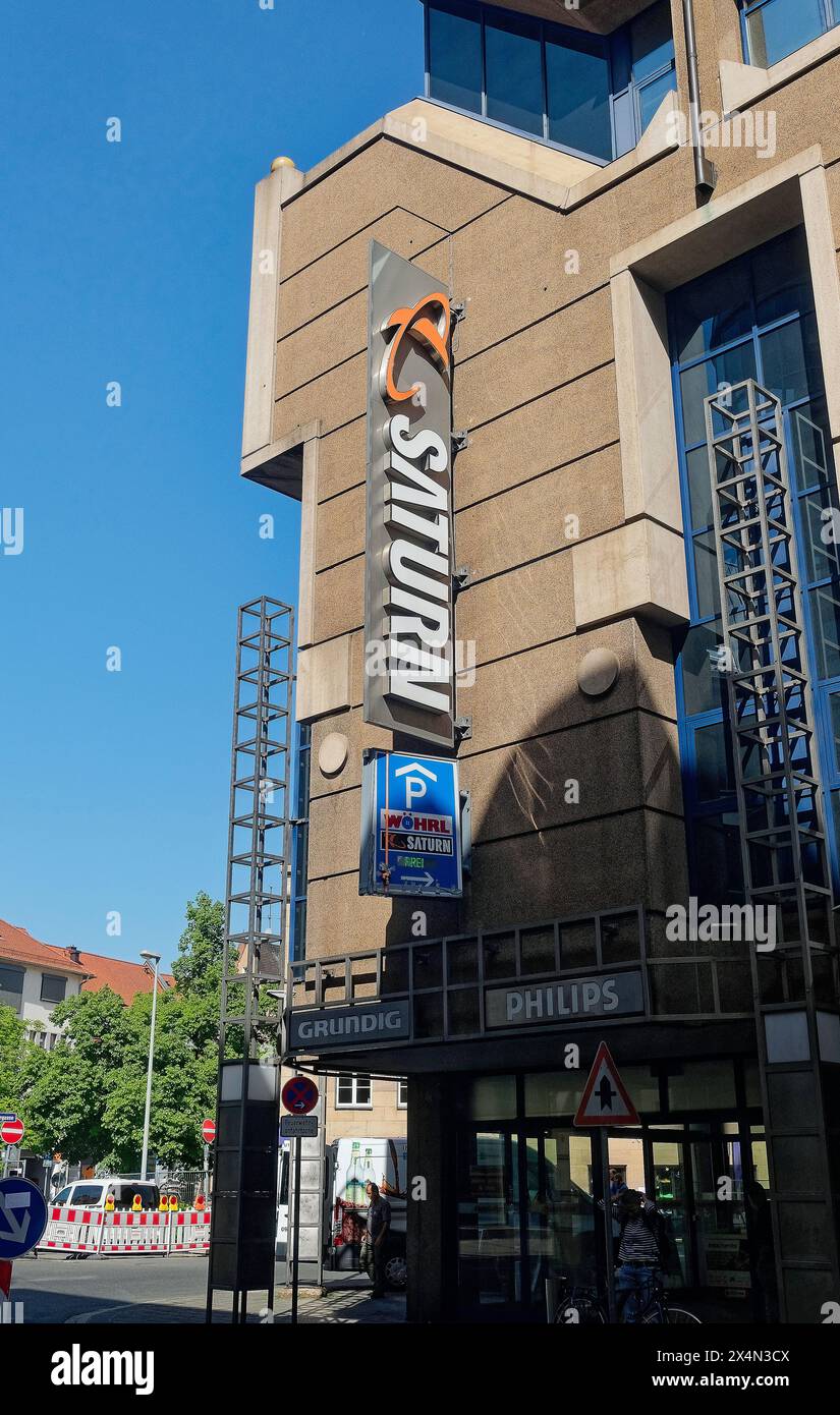 Lettering from the electrical retailer Saturn on the facade of a branch ...
