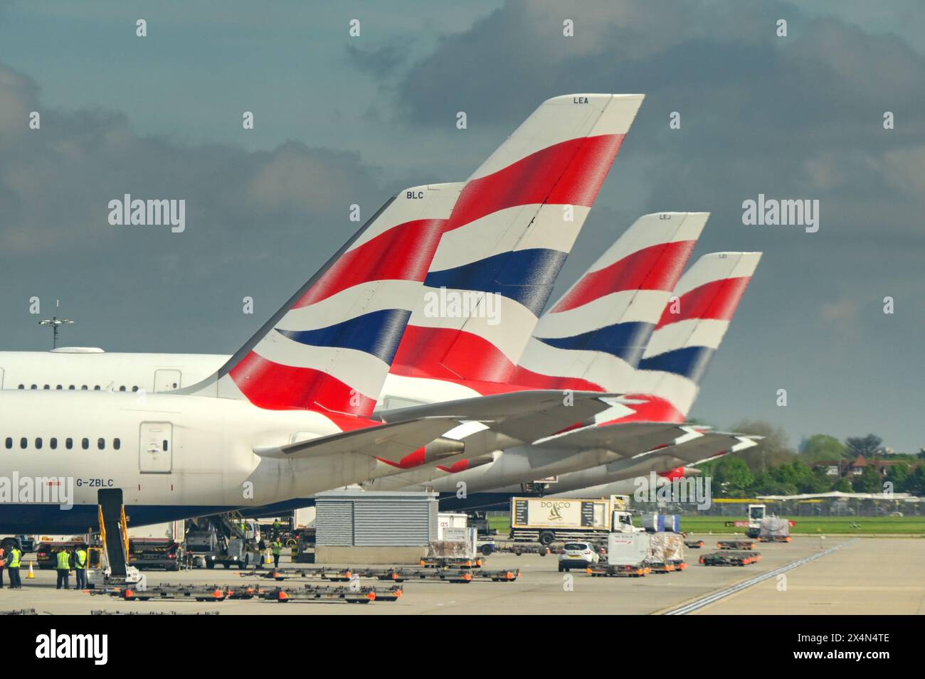 London, England, UK - 4 May 2024: Row of tail fins of planes operated ...