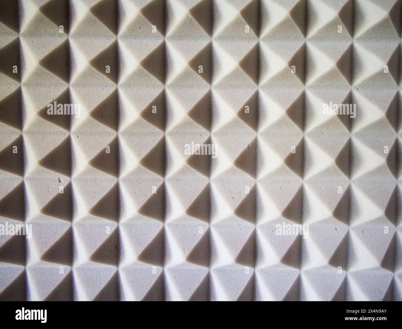 Sound Insulation Foam. Close-up of grey, pyramid-shaped acoustic foam ...