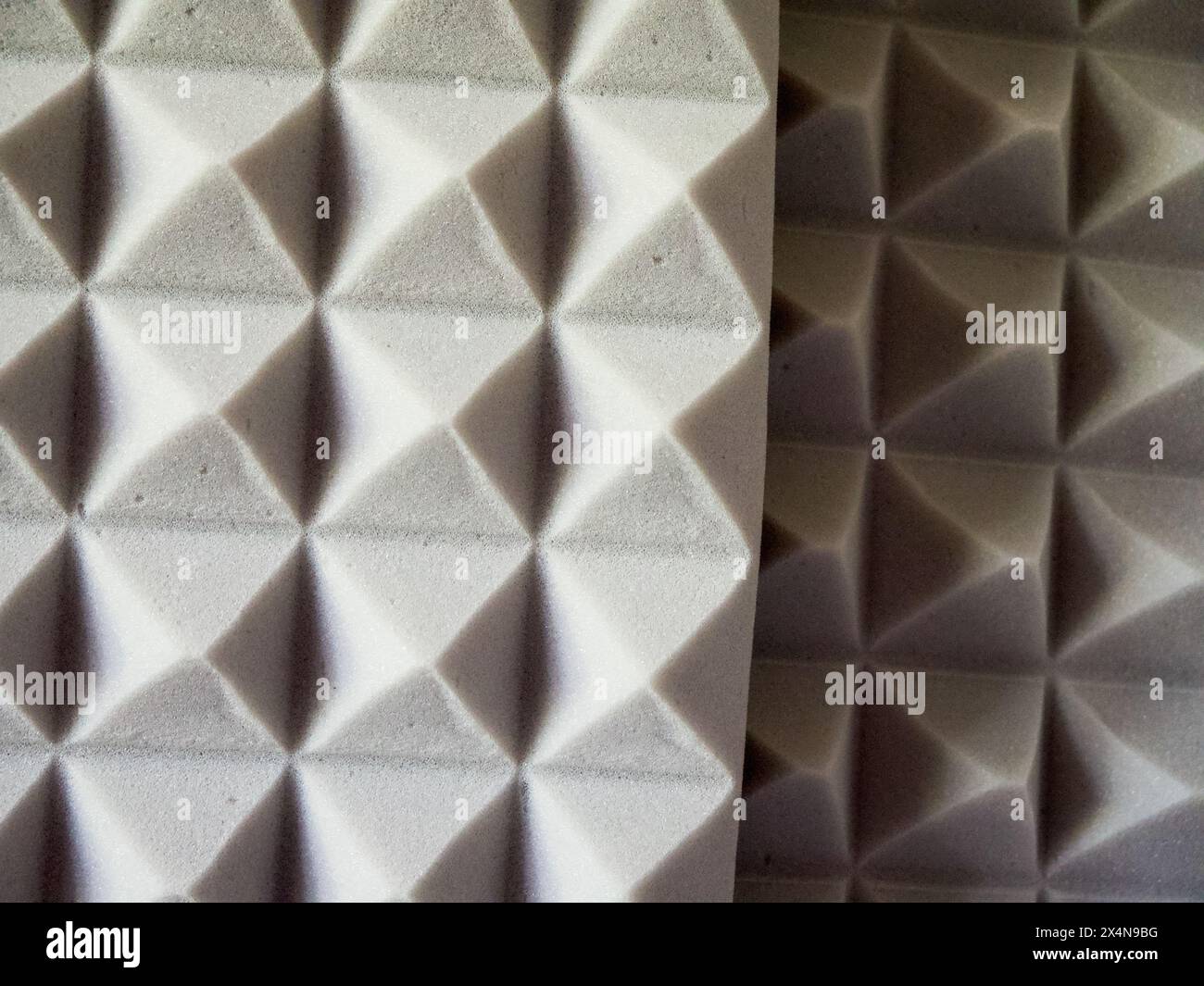 Sound Absorption Foam. Close-up of grey, pyramid-textured acoustic ...