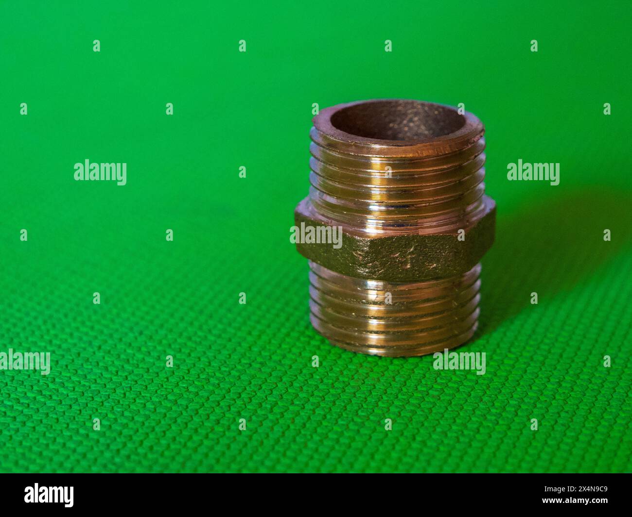 Plumbing Component Detail. Detailed brass pipe connector with precision ...