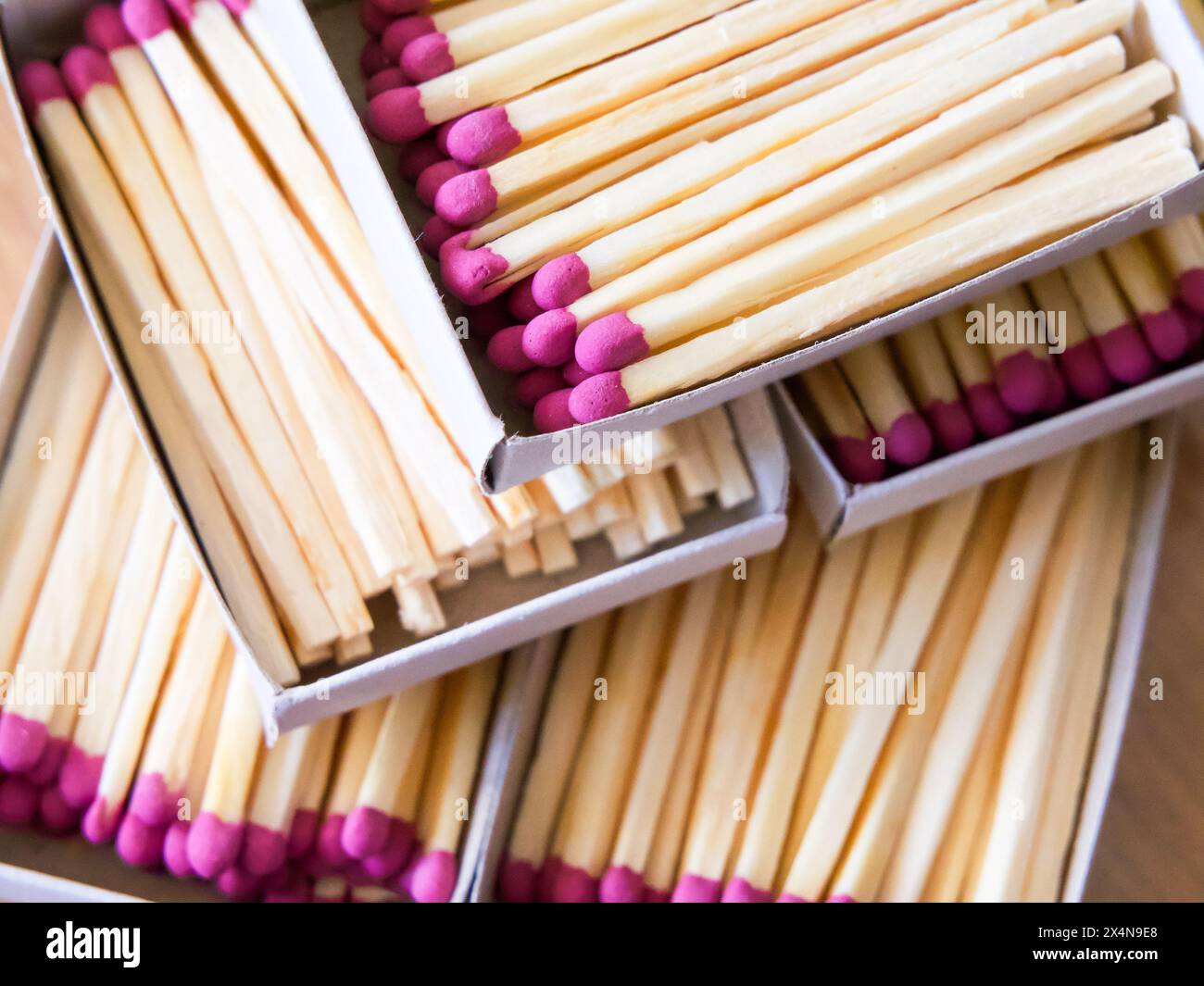 Matchstick Preparation. Matchboxes filled, pink-headed matches ready ...