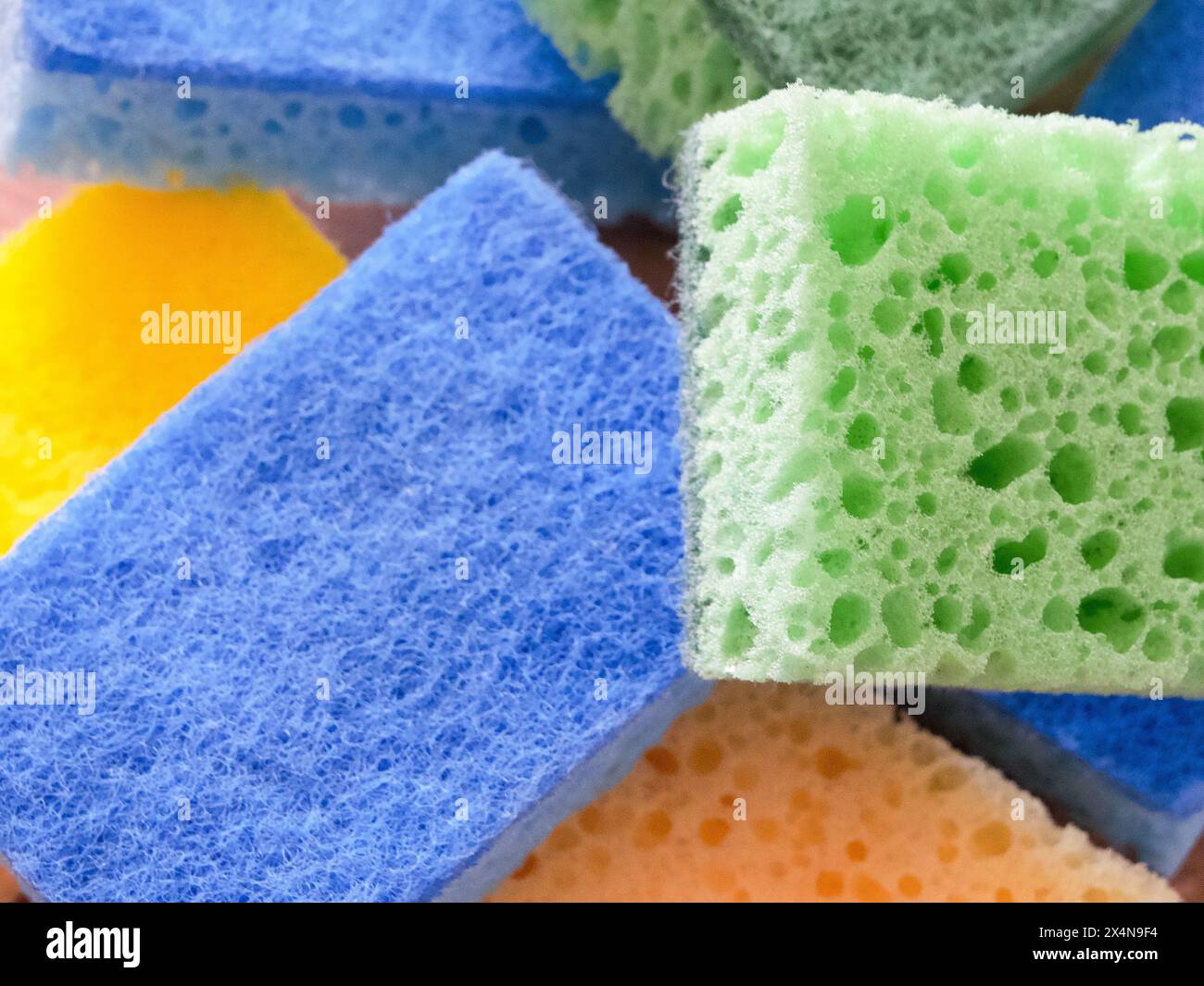 Vibrant Scrub Sponges. Brightly colored sponges with a focus on texture ...