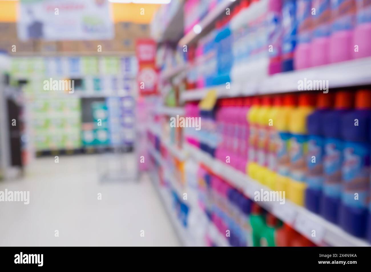 blur supermarket aisle with cleaning products shelves defocused background Stock Photo - Alamy