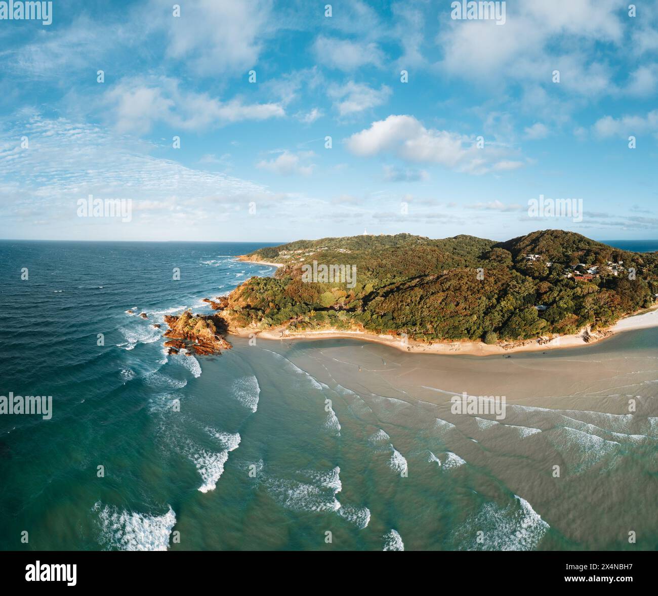 Byron Bay lighthouse and the pass high on the rocky headland - the most ...