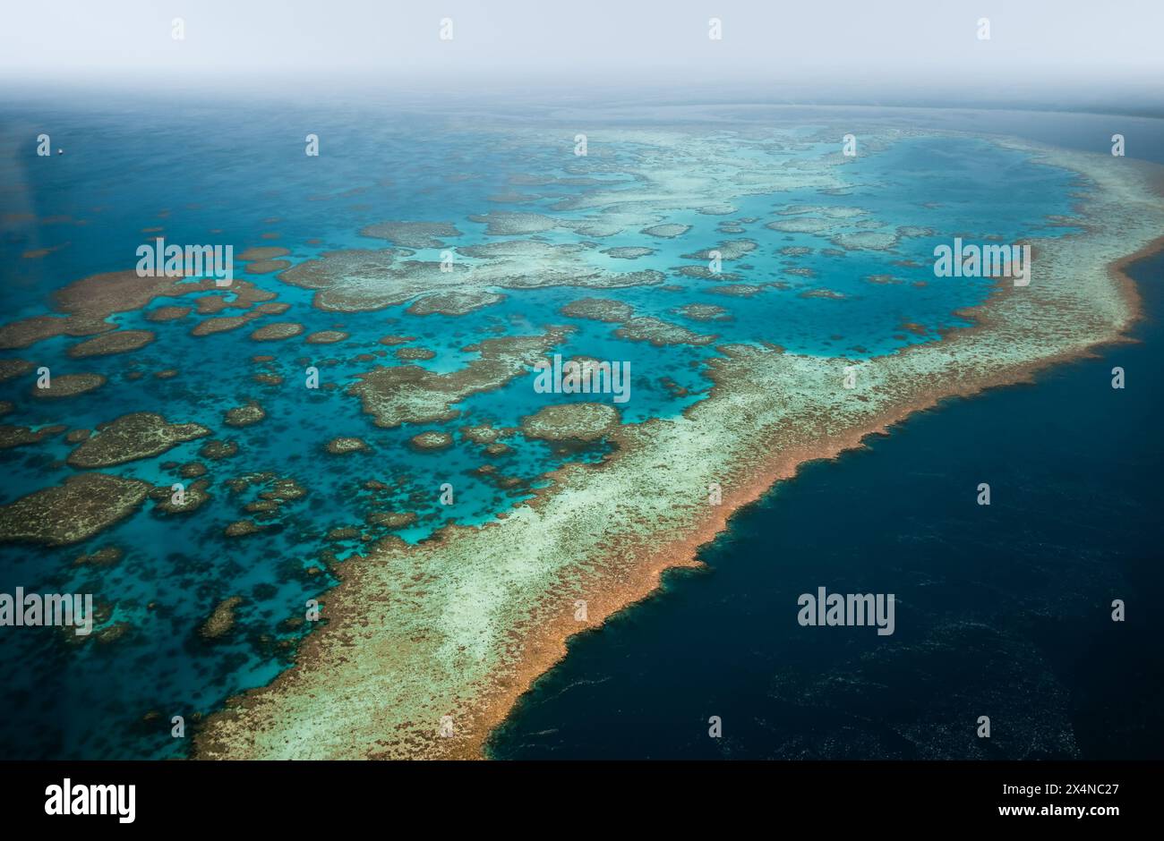 Aerial view of Great Barrier Reef coral reef structure in Whitsundays ...