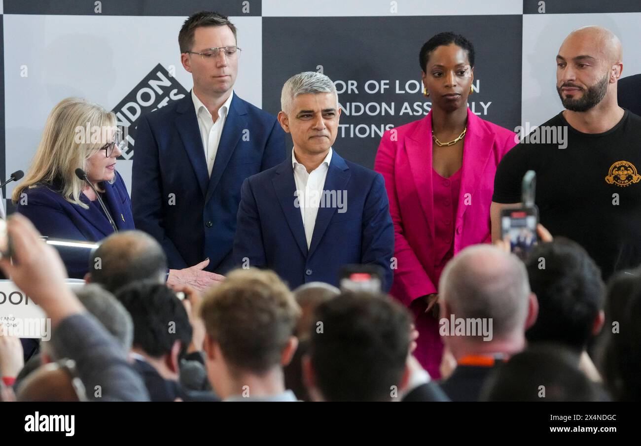 Labour's Sadiq Khan (centre) is re-elected as the Mayor of London, at ...