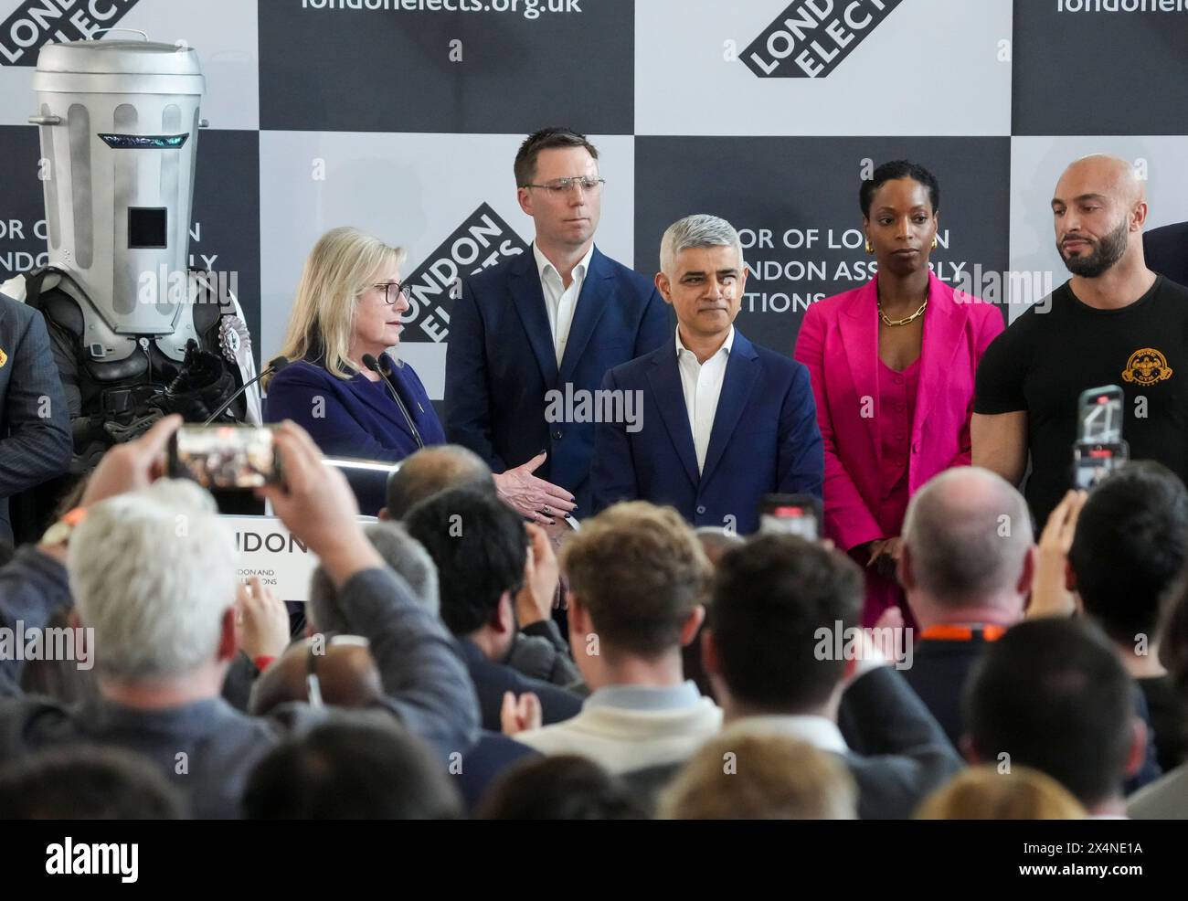 Labour's Sadiq Khan (centre) is re-elected as the Mayor of London, at ...