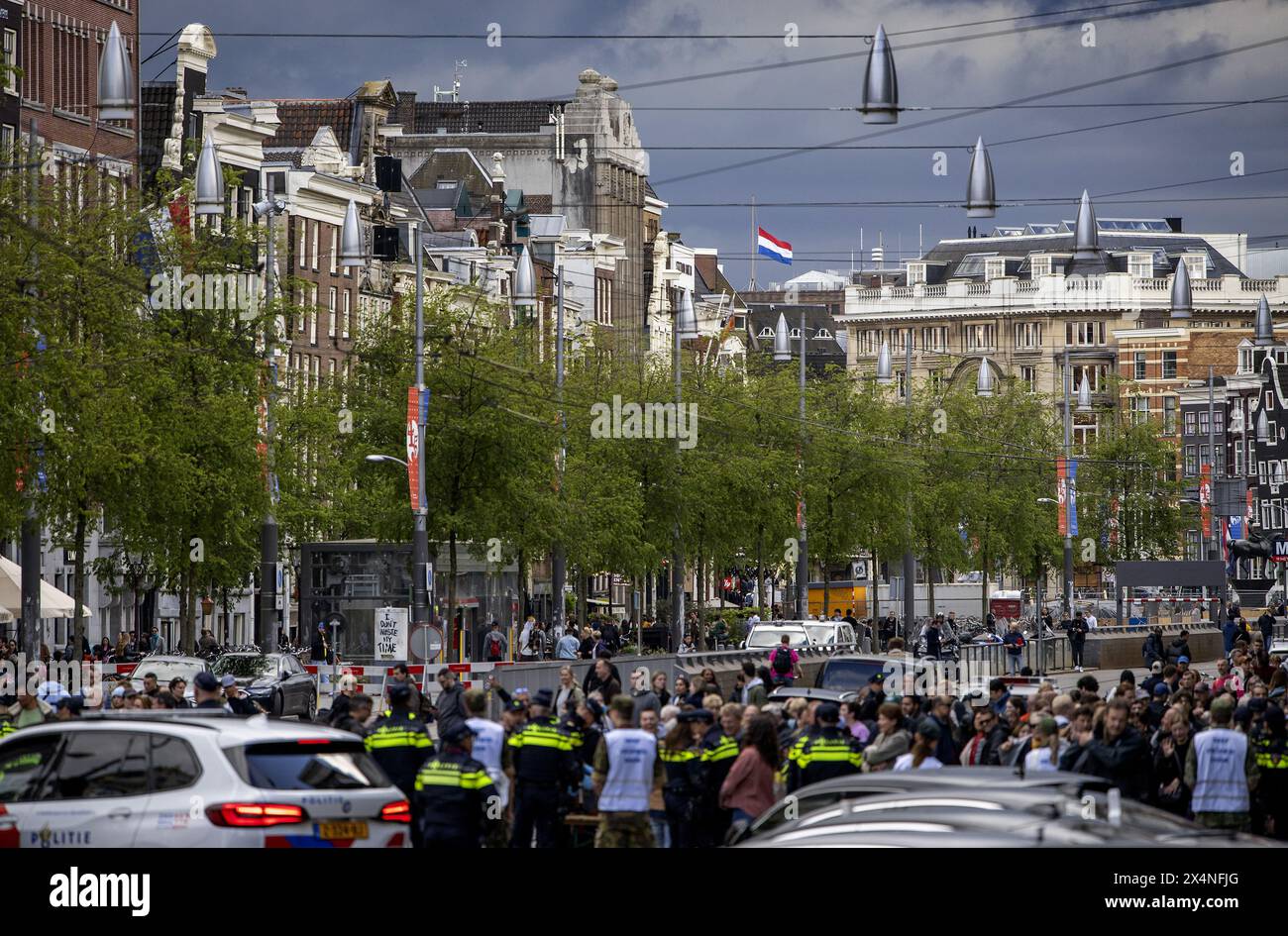 AMSTERDAM - Police check visitors to Dam Square prior to the National ...