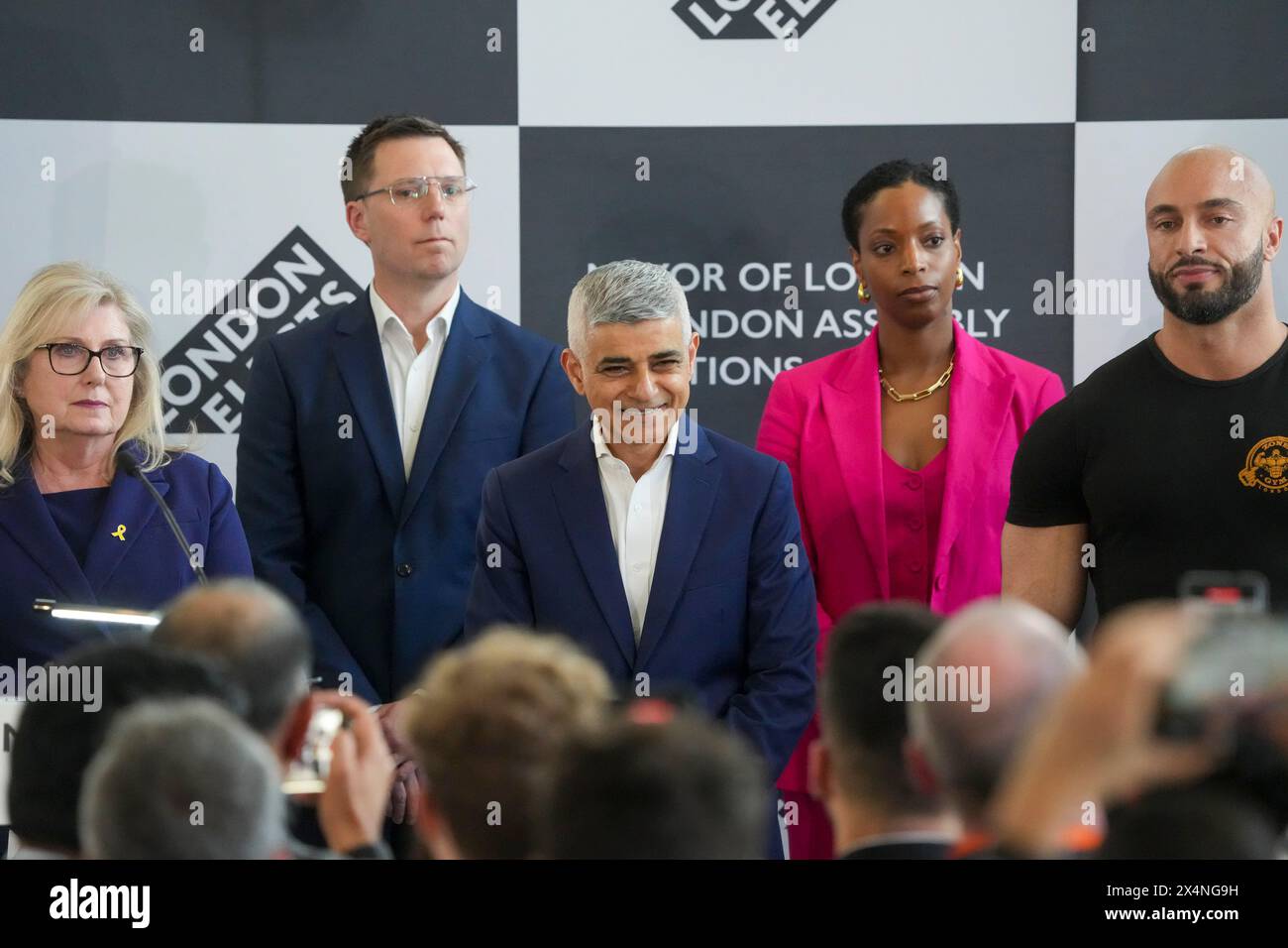Labour's Sadiq Khan (centre) is re-elected as the Mayor of London, at ...