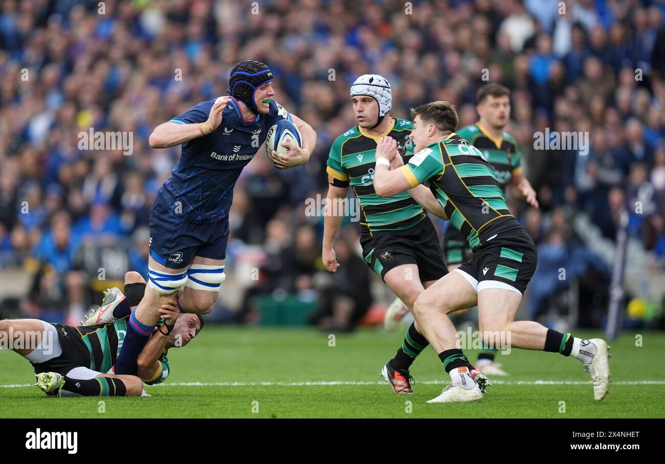 Leinster Rugby's Ryan Baird is tackled by Northampton Saints' Fin Smith ...
