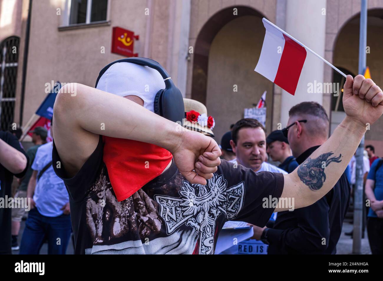 Warsaw, Poland. 01st May, 2024. A protestor in a balaklava of Polish ...