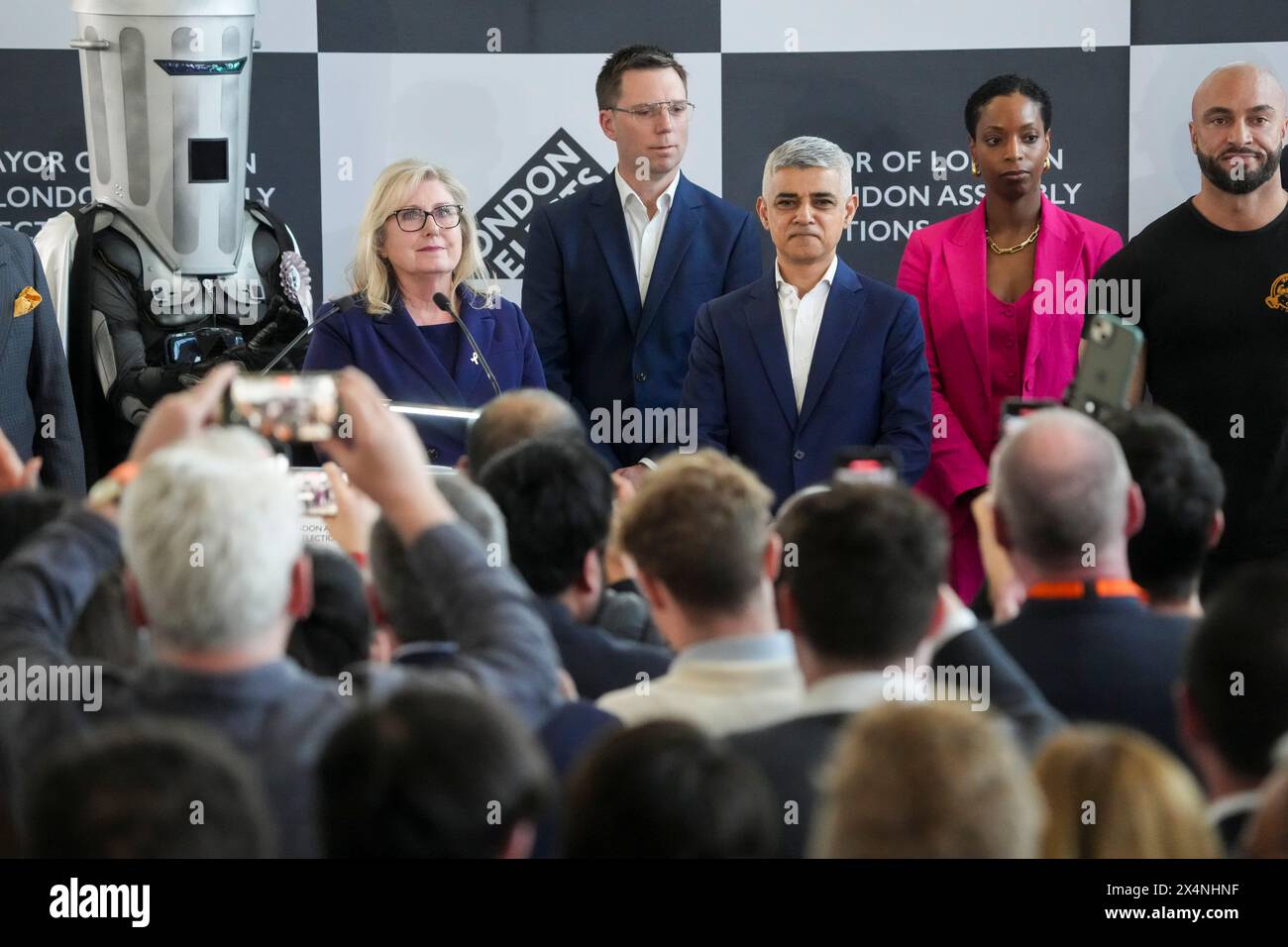 Labour's Sadiq Khan (centre) is re-elected as the Mayor of London, at ...