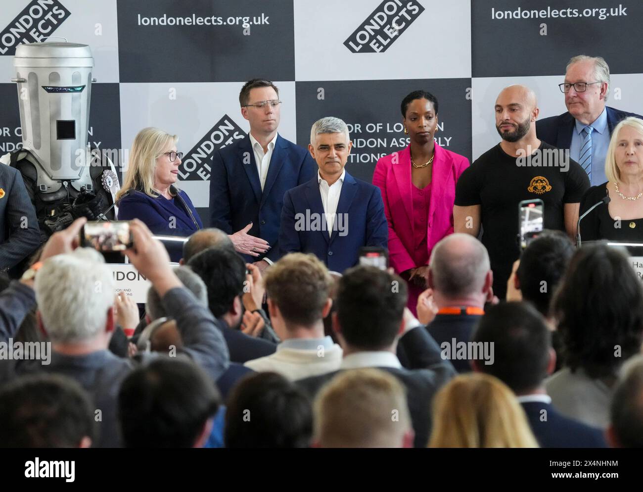 Labour's Sadiq Khan (centre) is re-elected as the Mayor of London, at ...