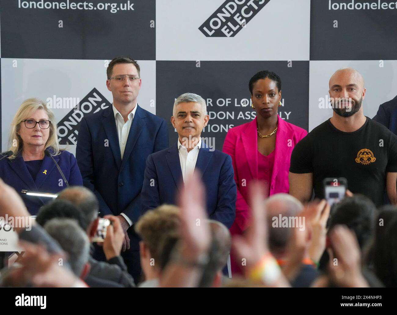 Labour's Sadiq Khan (centre) is re-elected as the Mayor of London, at ...