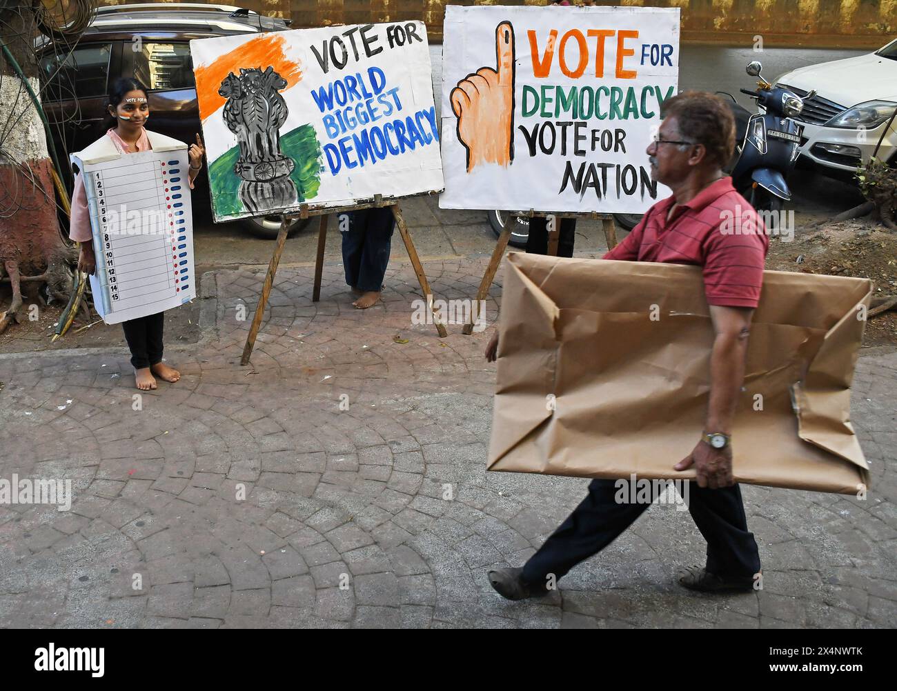 Students from Gurukul school of art pose for a photo near painted ...