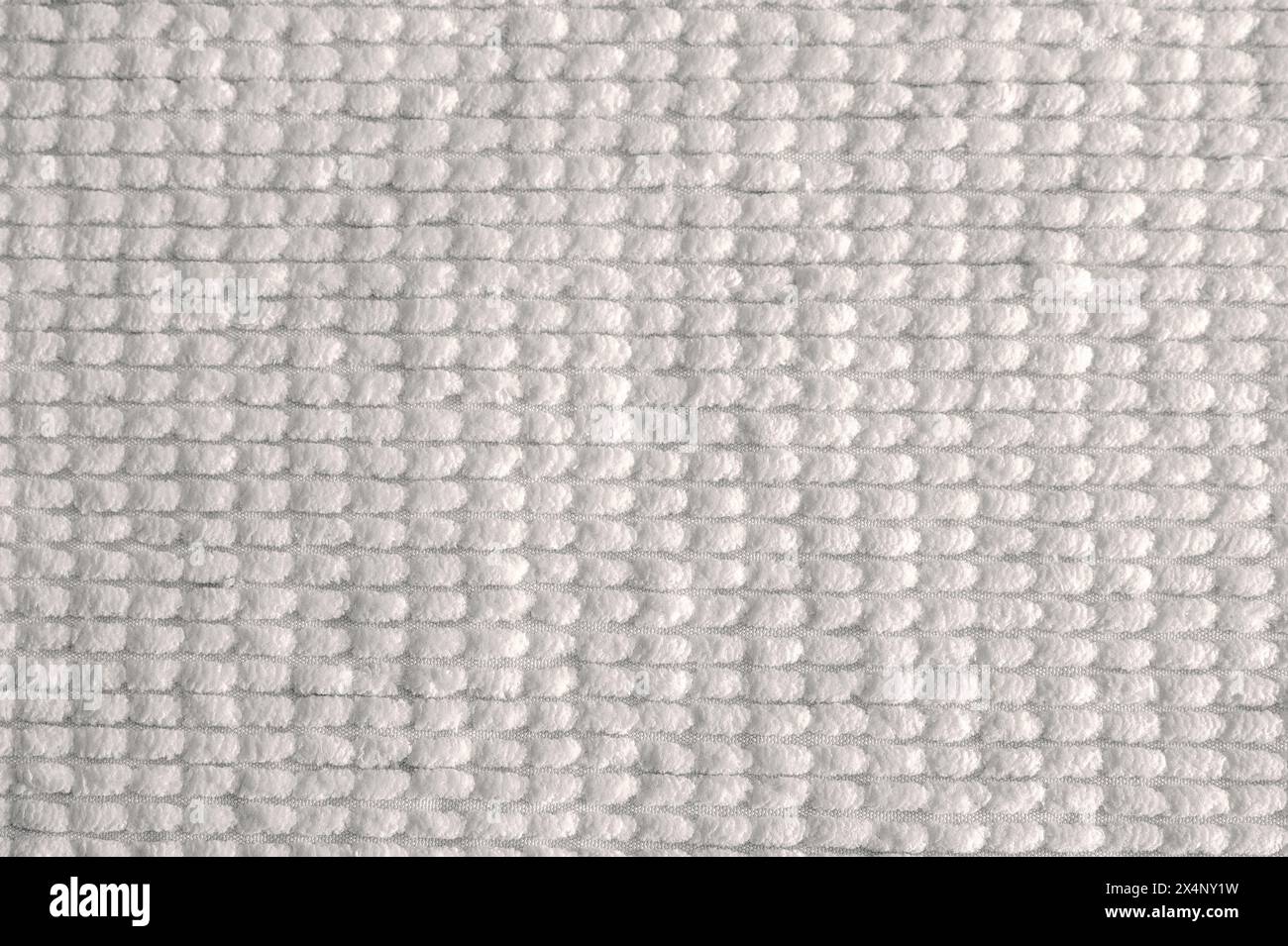 looped cotton fabric. Skeins of plush yarn for hand knitting with ready ...