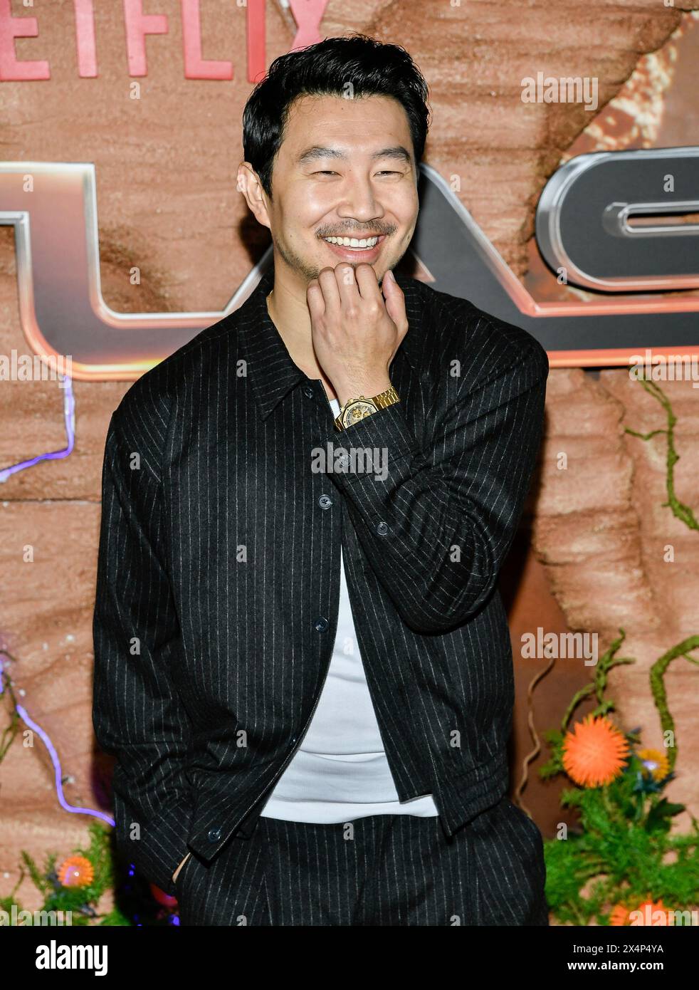 Simu Liu participates in a Netflix "Atlas" photo call at the Four ...