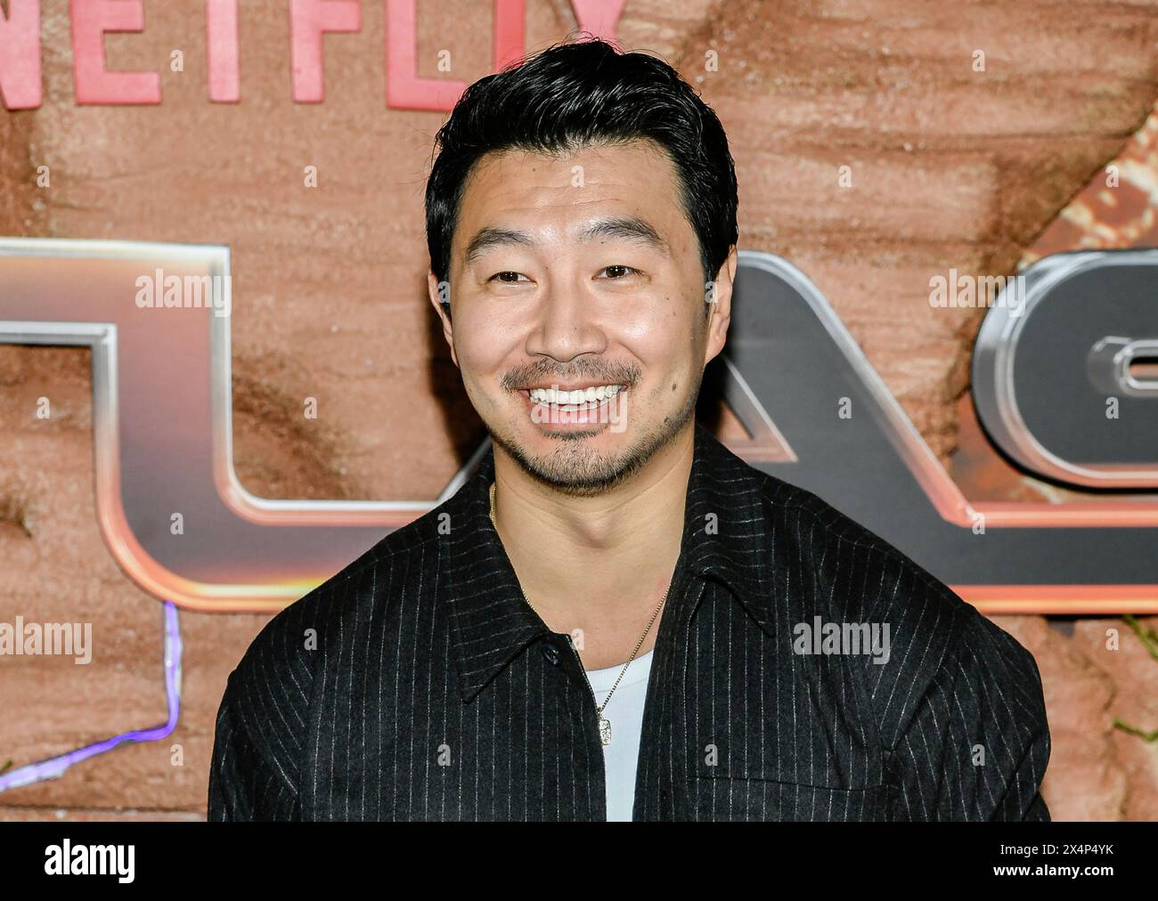 Simu Liu participates in a Netflix "Atlas" photo call at the Four ...
