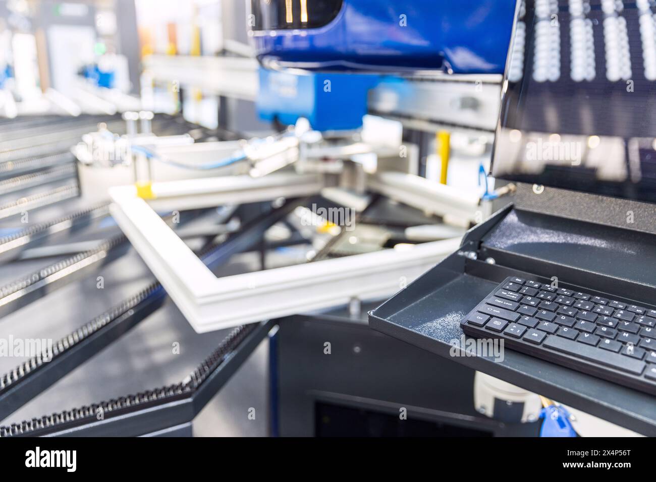 Full production line for PVC windows and doors Stock Photo - Alamy