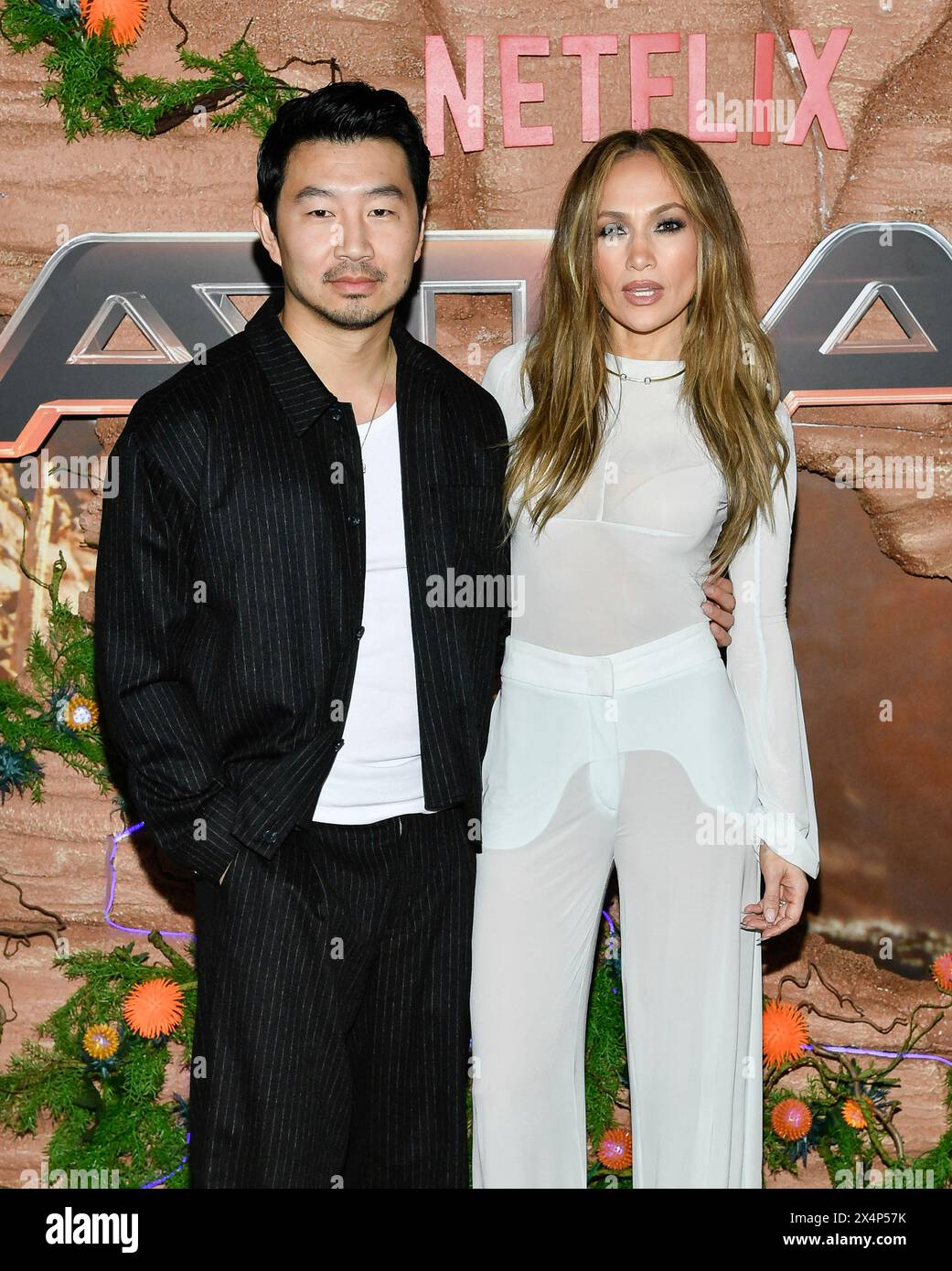 Simu Liu, left, and Jennifer Lopez participate in a Netflix "Atlas ...