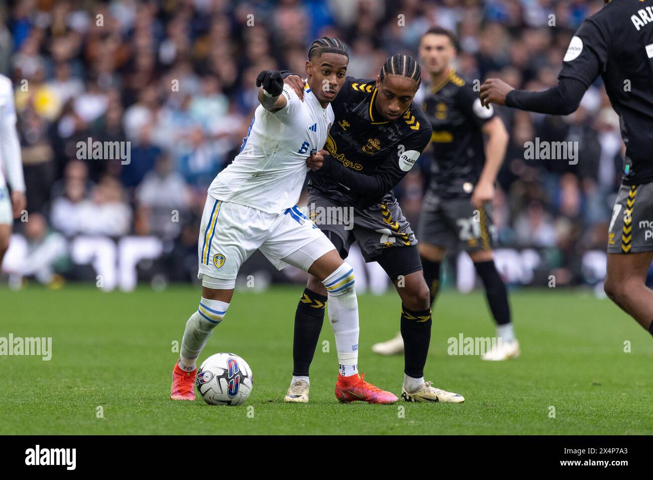 Crysencio Summerville (Leeds United) battles with Kyle Walker-Peters ...