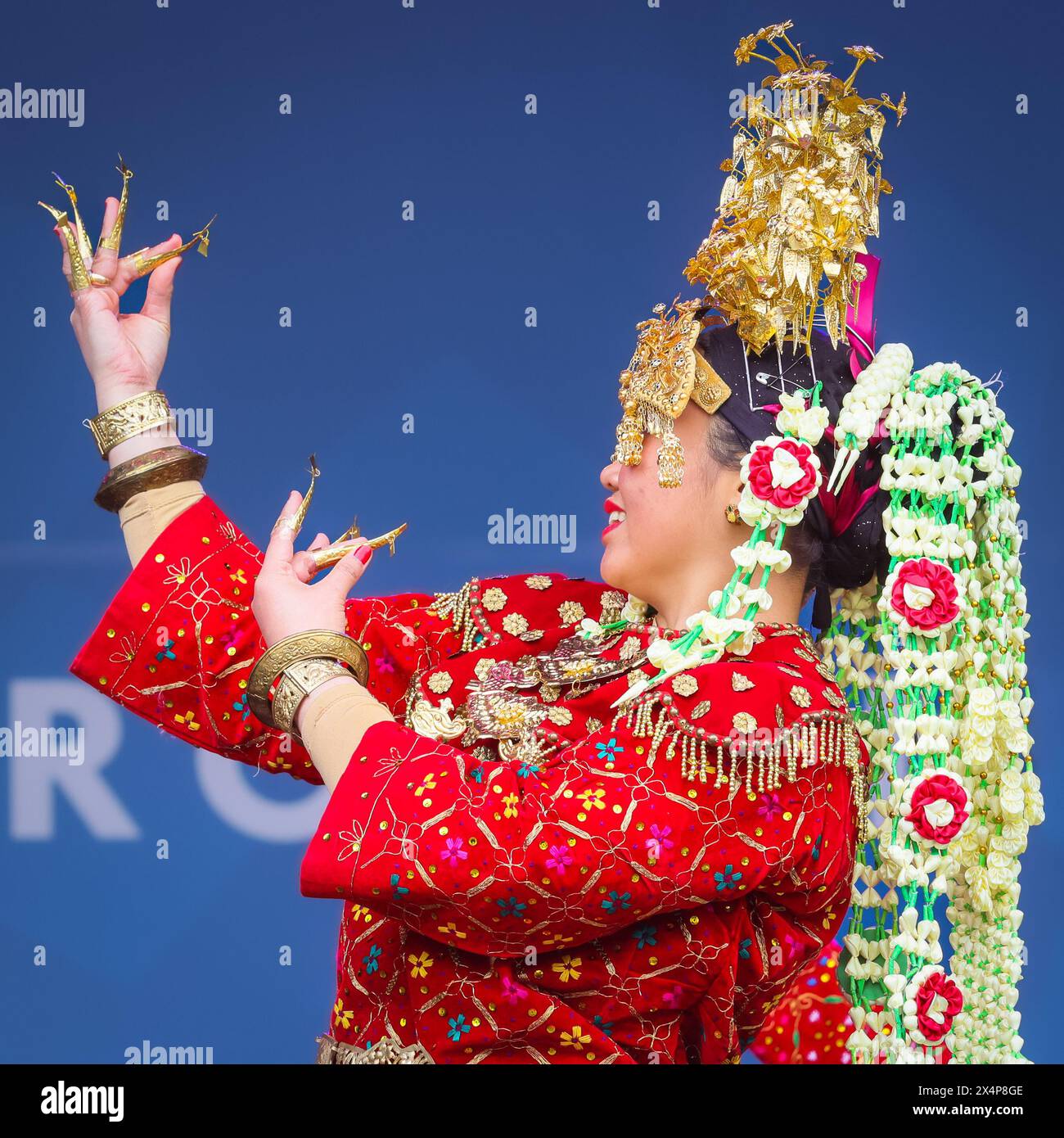 London, UK. 20th April 2024. Performers entertain the crowds, here the ...