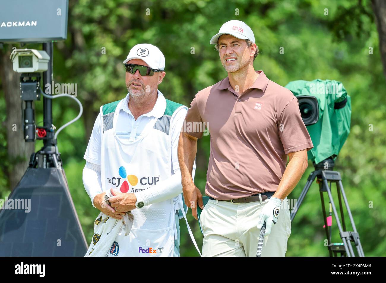 McKinney, TX, USA. 04th May, 2024. Adam Scott confers with his caddie ...