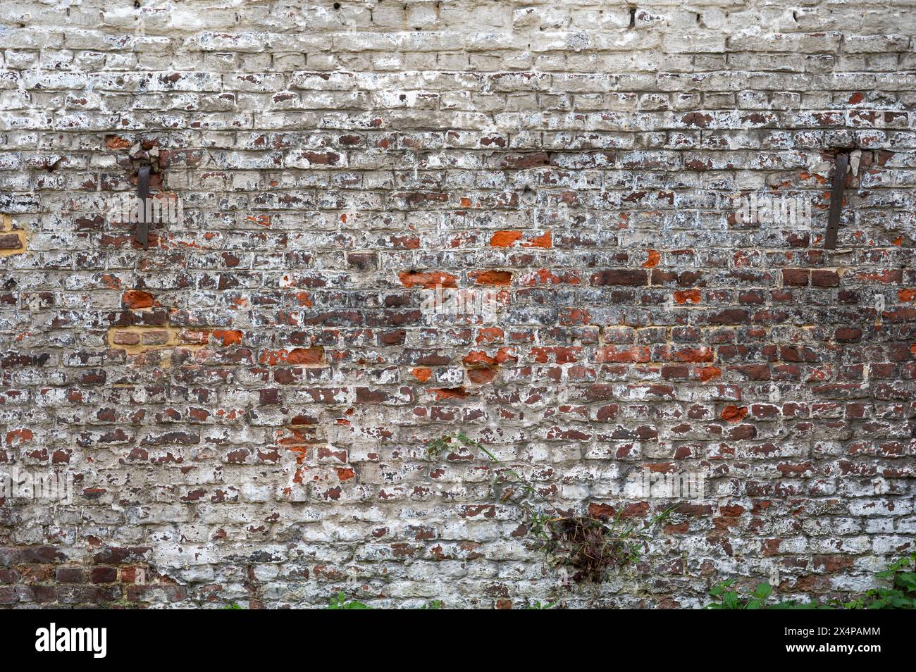 Dirty brick stone wall with mortar layers, textured background in ...