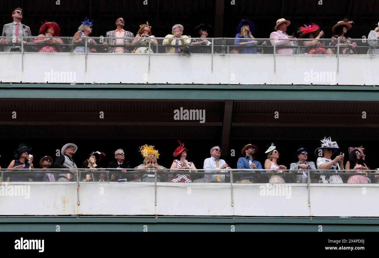 Louisville, United States. 04th May, 2024. Horse racing fans cheer for ...