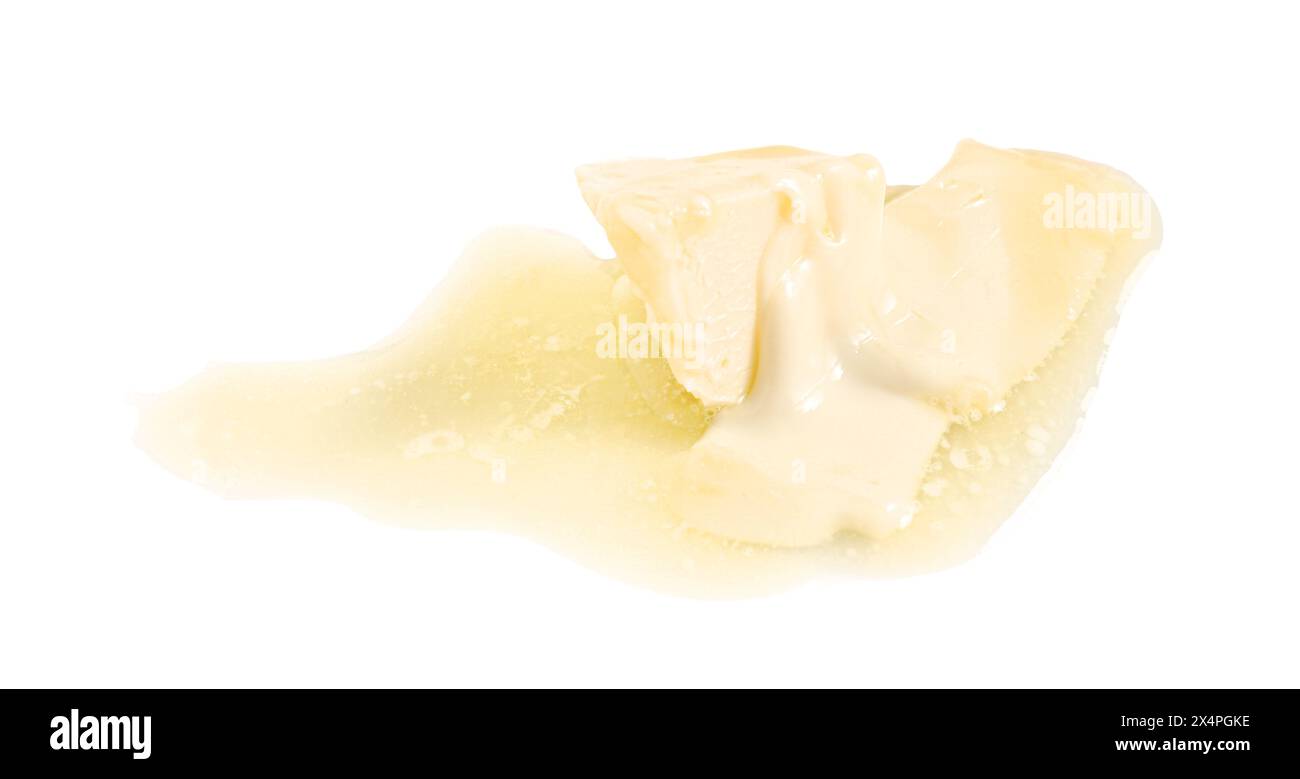 Piece of melting butter on white background Stock Photo - Alamy