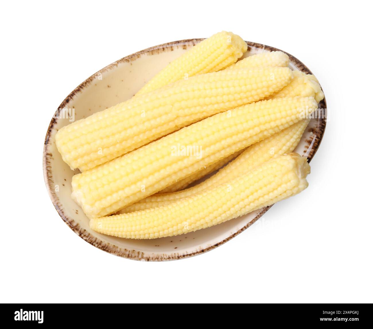 Tasty fresh yellow baby corn in bowl isolated on white, top view Stock ...