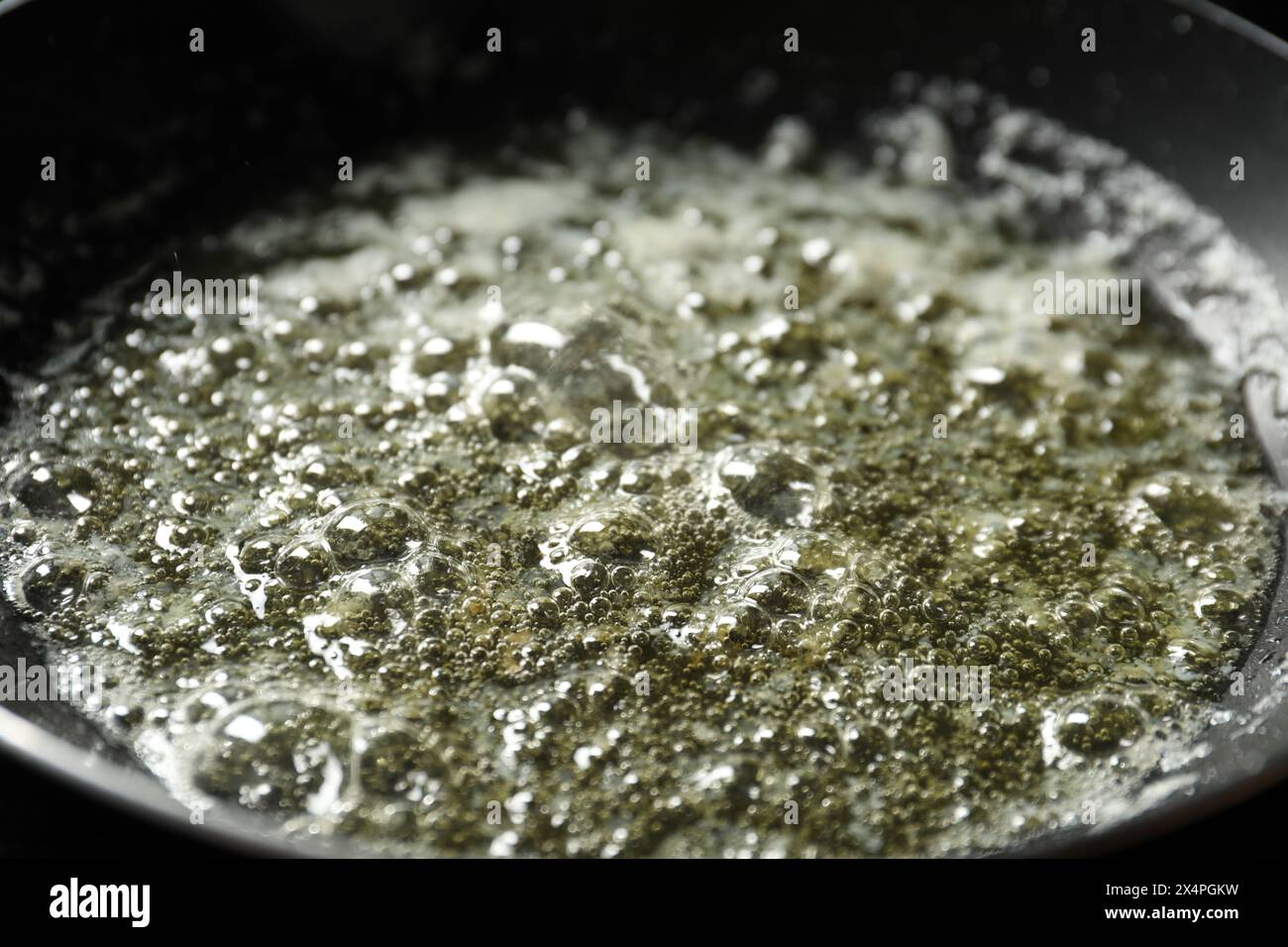 Hot pan melting butter hi-res stock photography and images - Alamy
