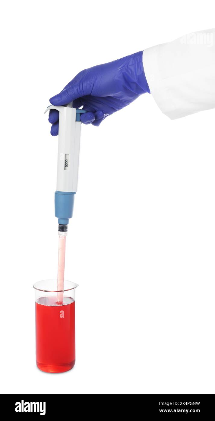 Laboratory analysis. Scientist dripping sample with micropipette into ...