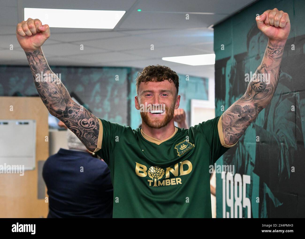 Dan Scarr of Plymouth Argyle celebrates a win at full time during the ...