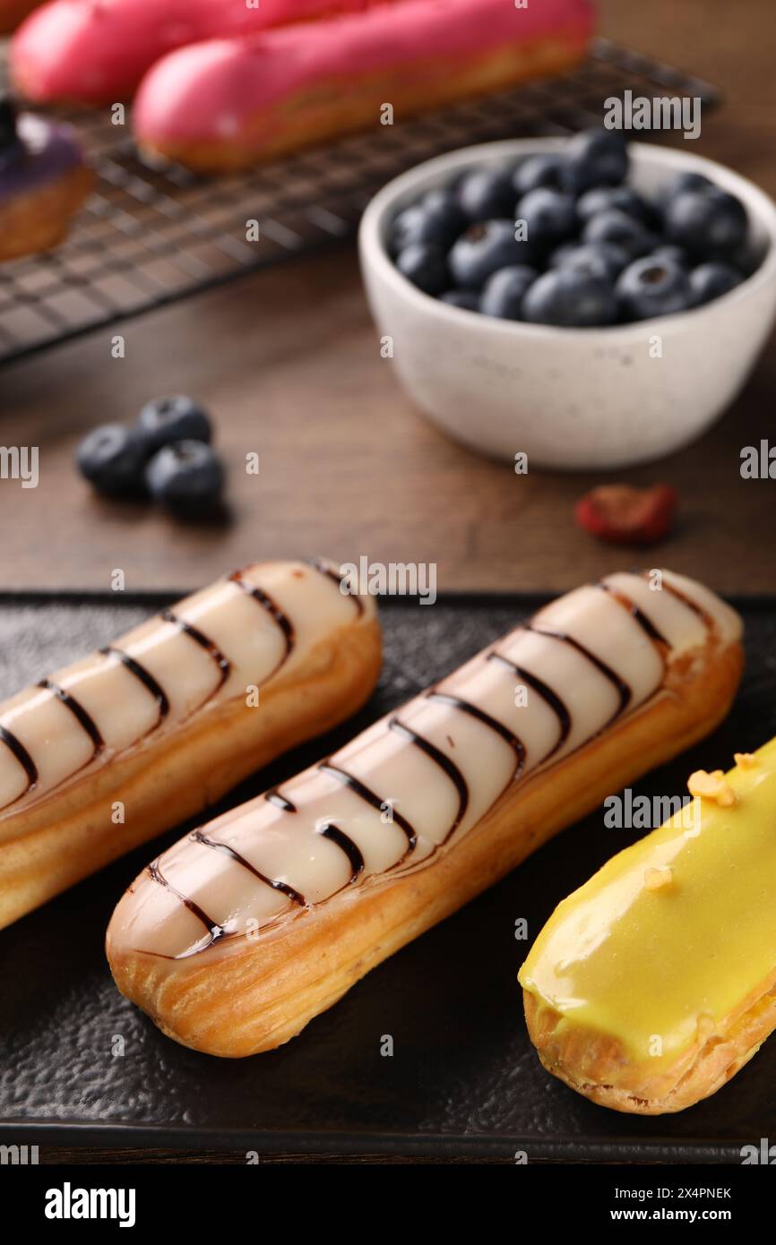 Different tasty glazed eclairs hi-res stock photography and images - Alamy