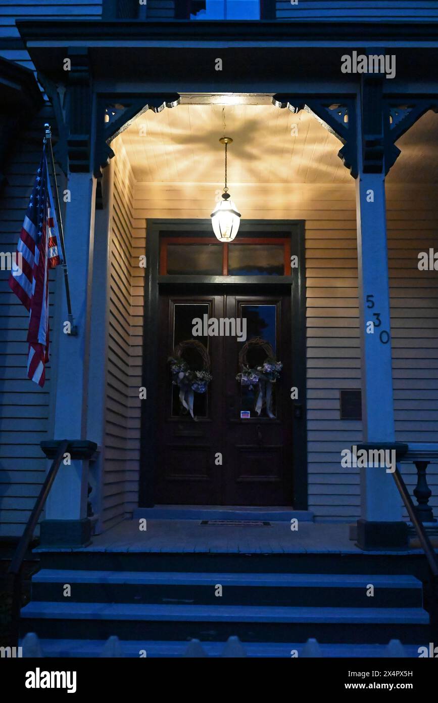 A front porch light at dusk Stock Photo - Alamy