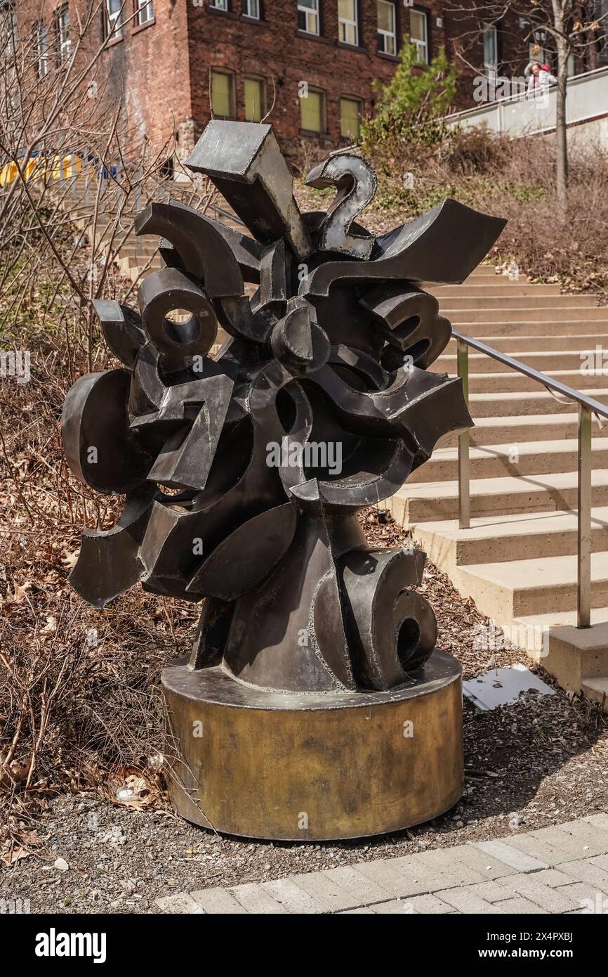 An outdoor sculpture made out of numbers stick together Stock Photo - Alamy