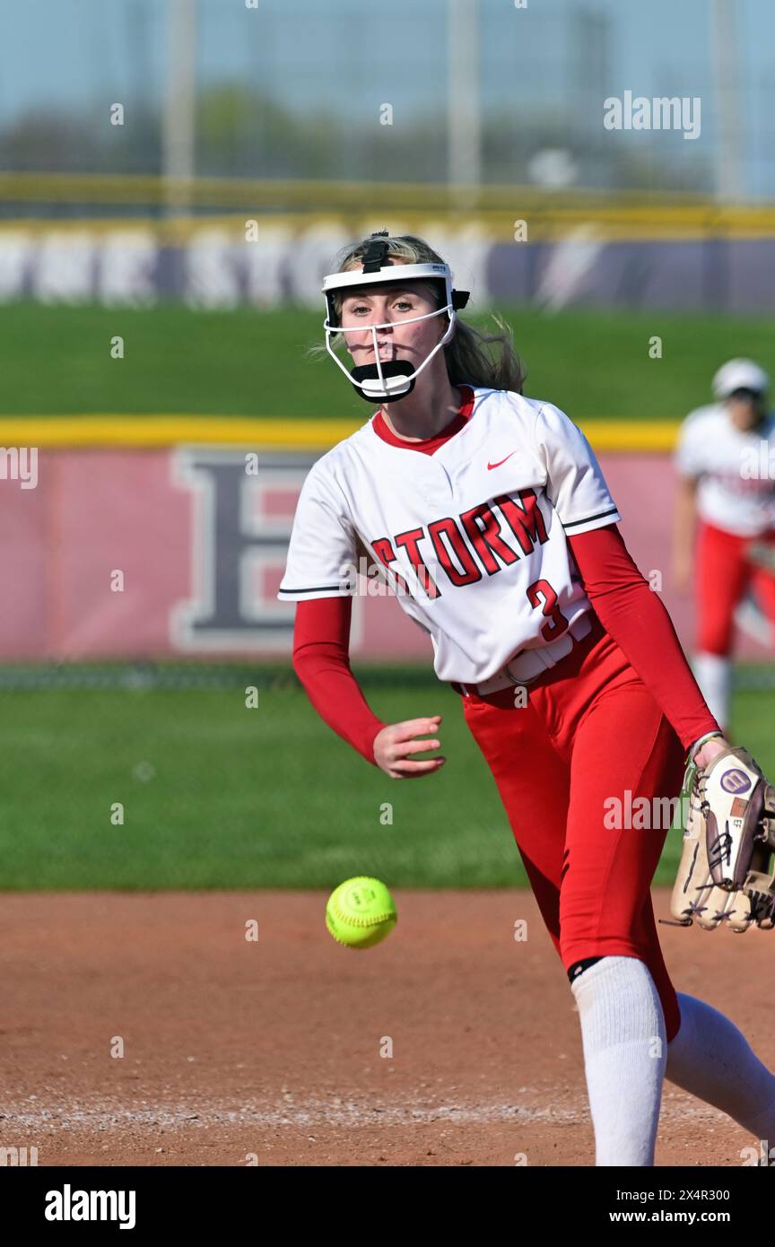 USA: Pitcher delivering a pitch to a waiting hitter during a high ...