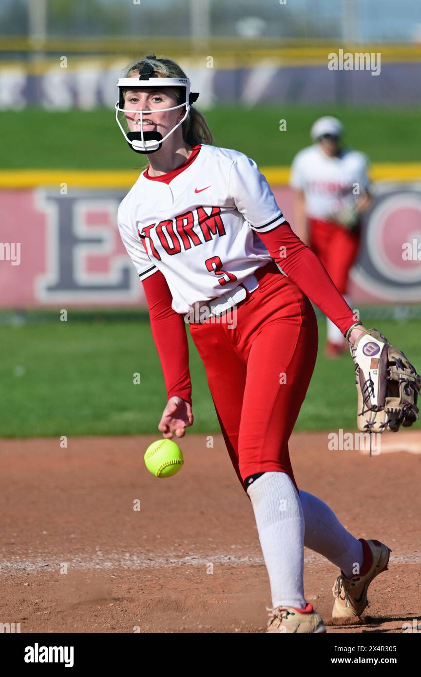 USA: Pitcher delivering a pitch to a waiting hitter during a high ...