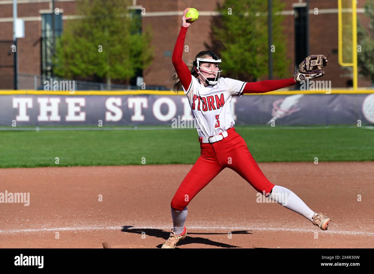 USA: Pitcher delivering a pitch to a waiting hitter during a high ...
